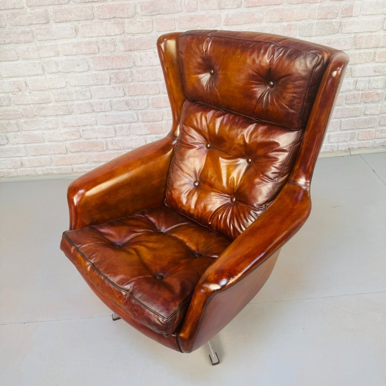 1970s Danish Swivel Egg Tan Leather Chair | Vinterior