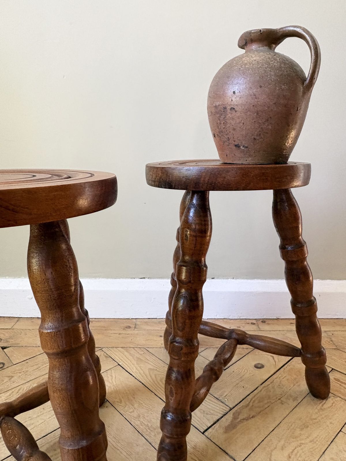 A Matching Pair Of Bullseye Bobbin Stools | Vinterior